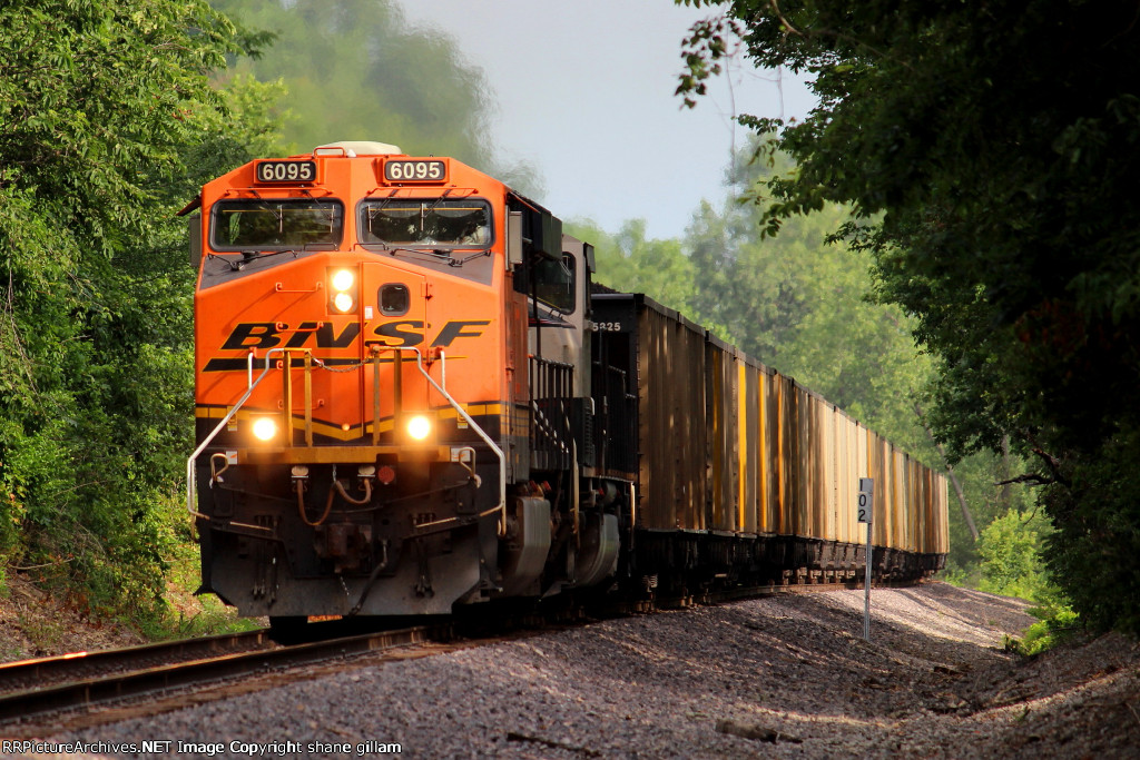 BNSF 6095 leads a loaded ucex coal sb.